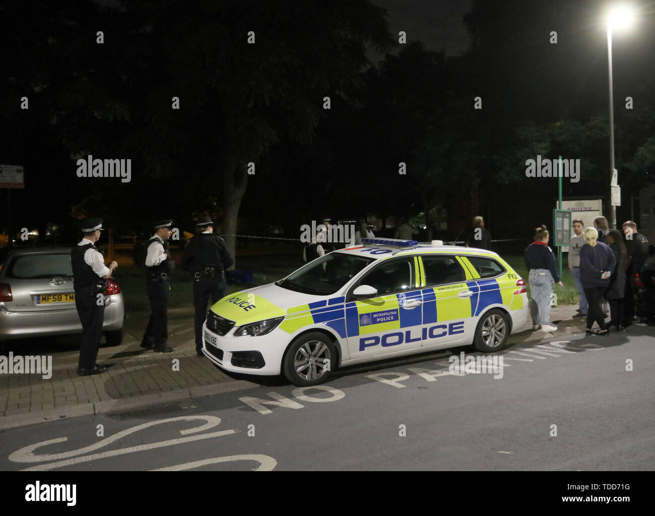 Police officers near to the scene in Deeside Road in Wandsworth, south ...