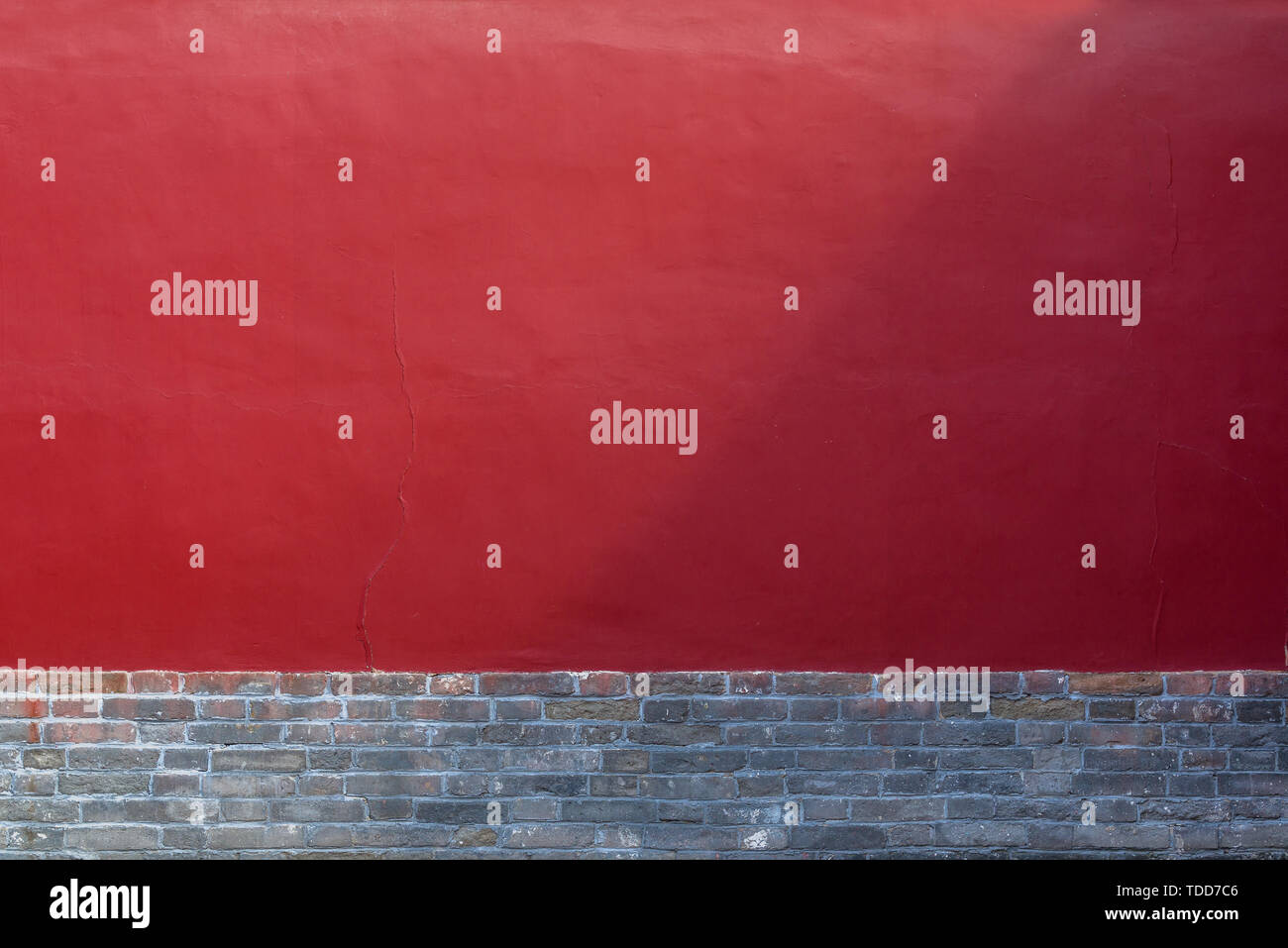 Dark red Imperial Palace wall Stock Photo - Alamy