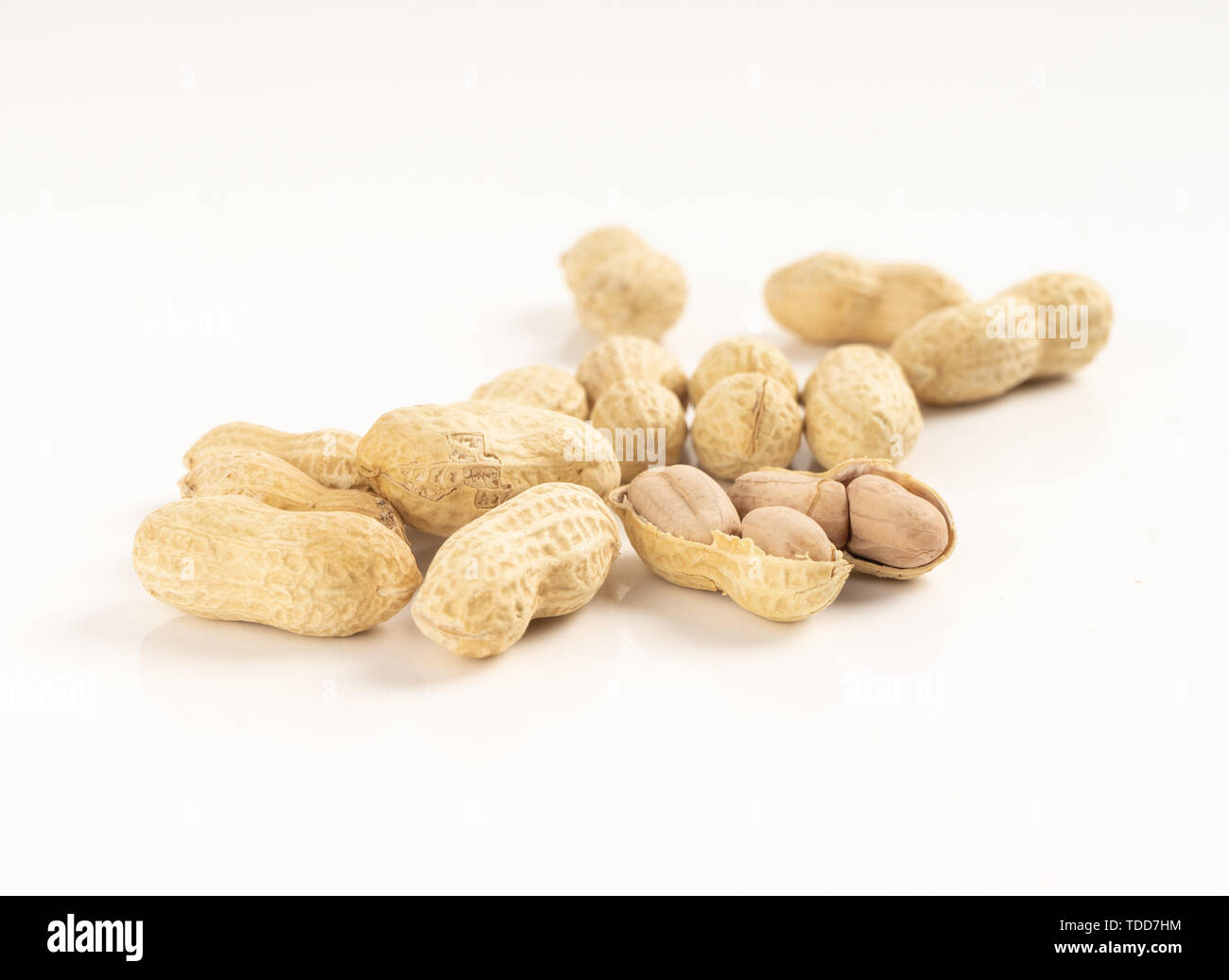 Multi-flavored thin-skinned peanuts Stock Photo - Alamy