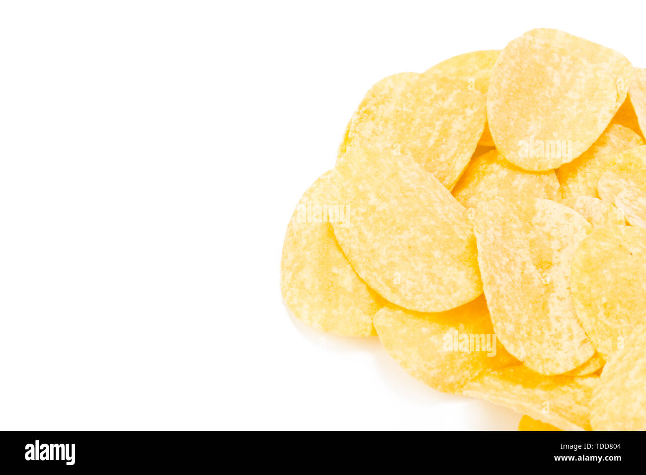 yellow potato chips isolated on white Stock Photo - Alamy