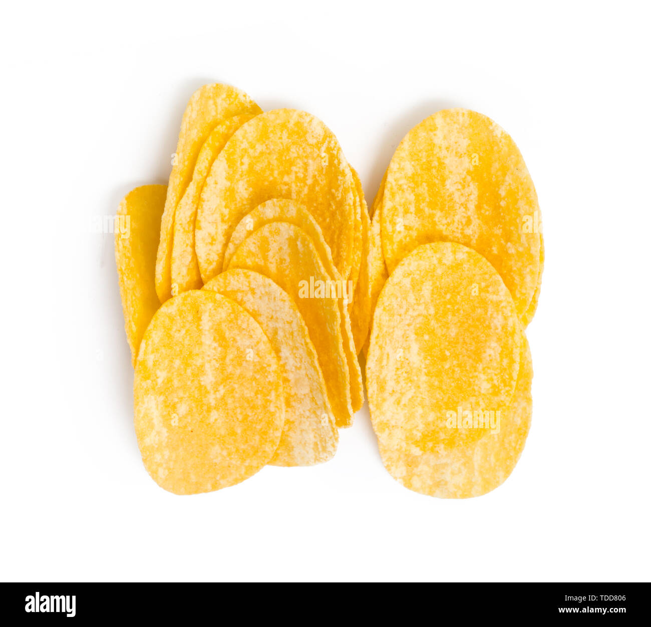yellow potato chips isolated on white Stock Photo - Alamy