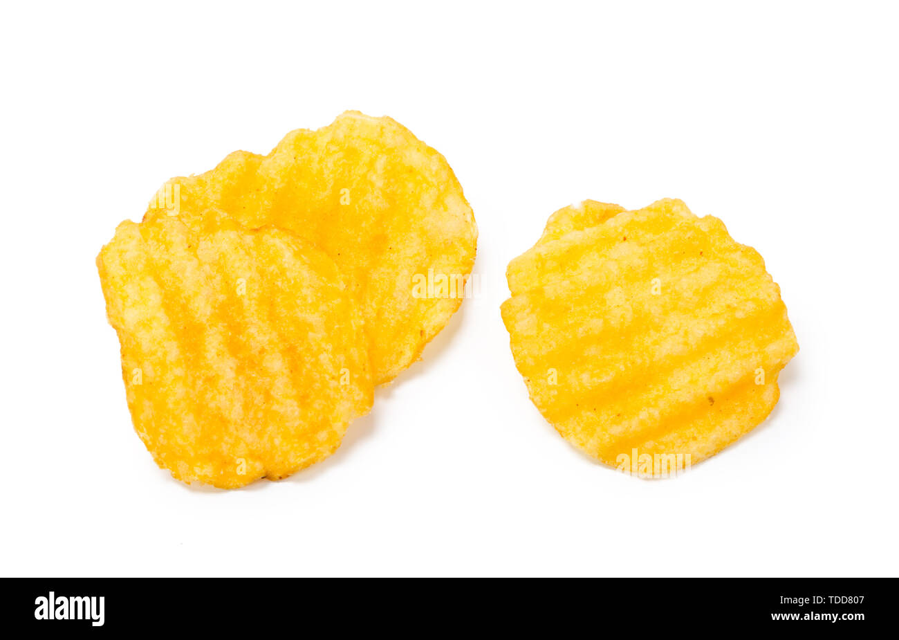 yellow potato chips isolated on white Stock Photo - Alamy