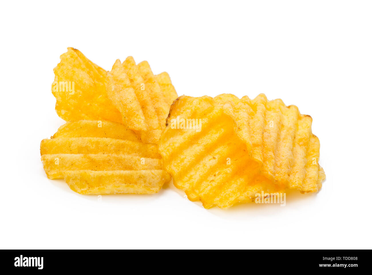 yellow potato chips isolated on white Stock Photo - Alamy