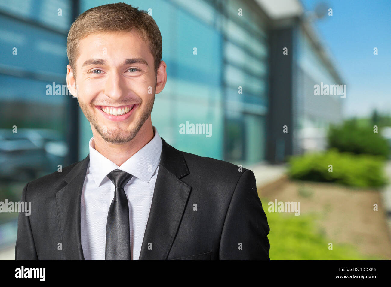 Happy smart business man Stock Photo - Alamy