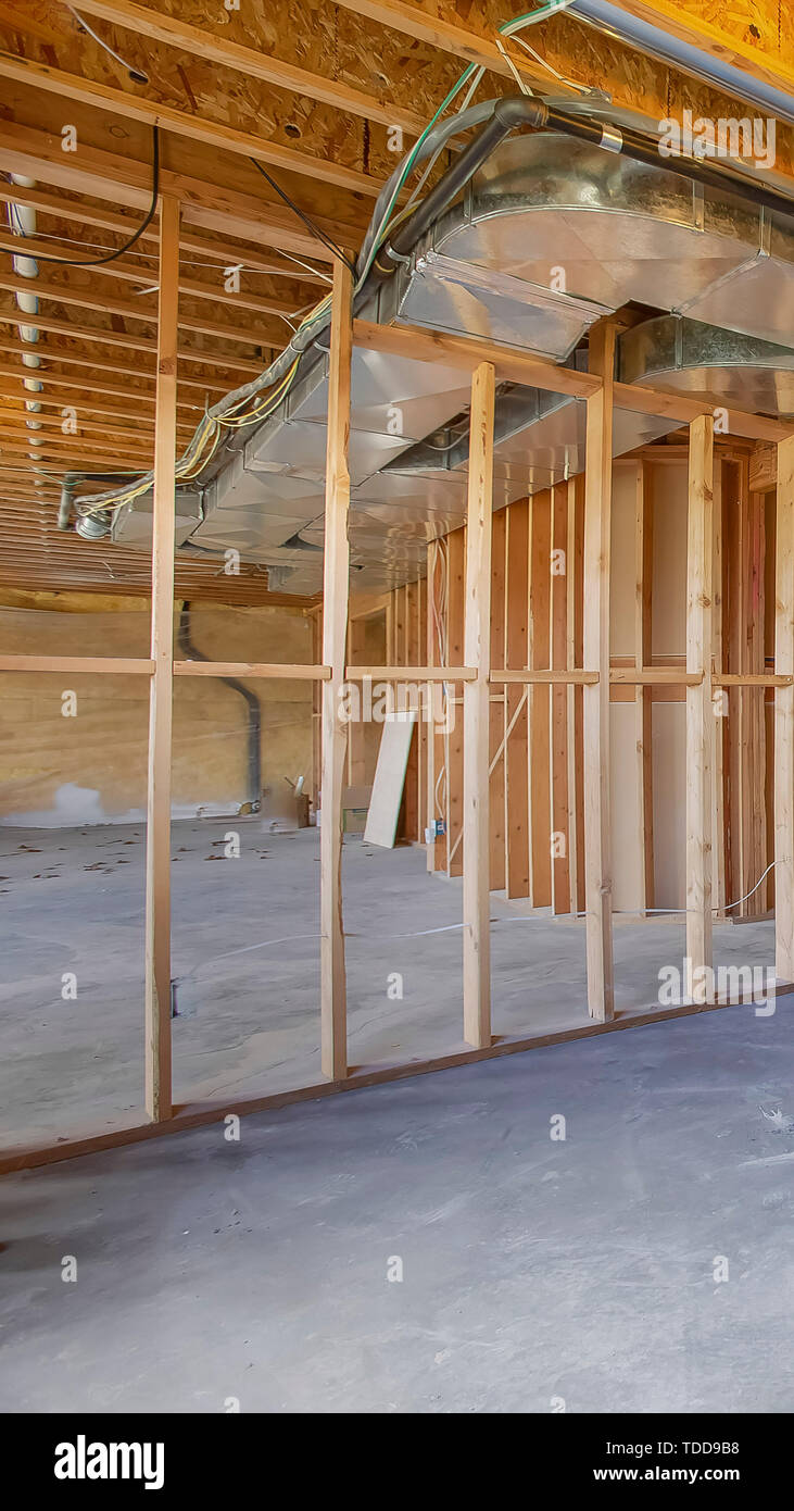 Vertical frame House interior under construction with air conditioning ...