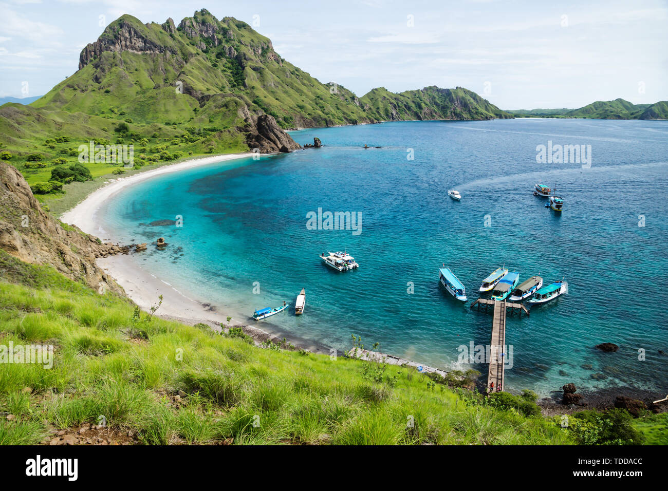 Palau Padar bay with green hills in Komodo National Park, Flores ...