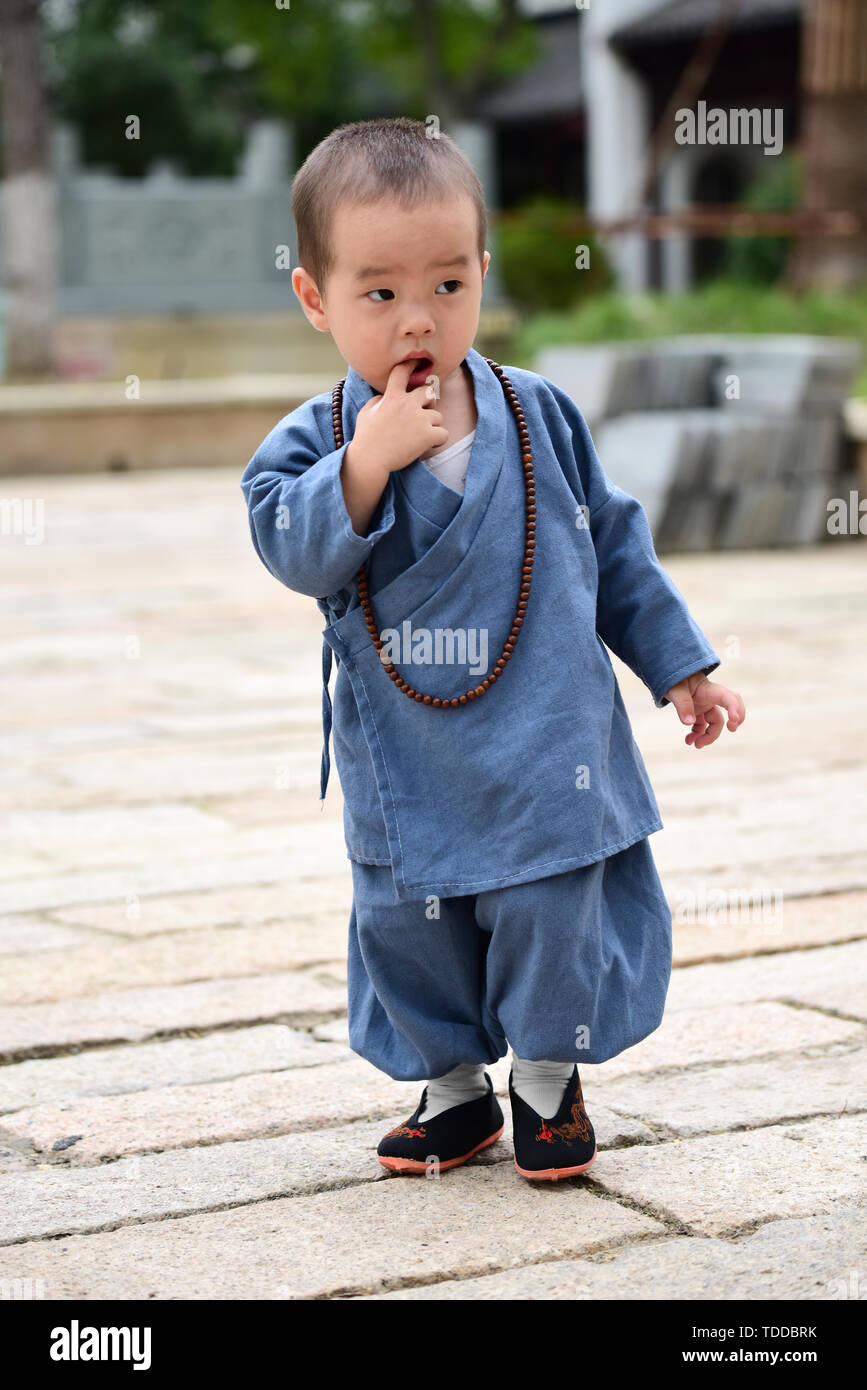 Cute little monk Stock Photo - Alamy