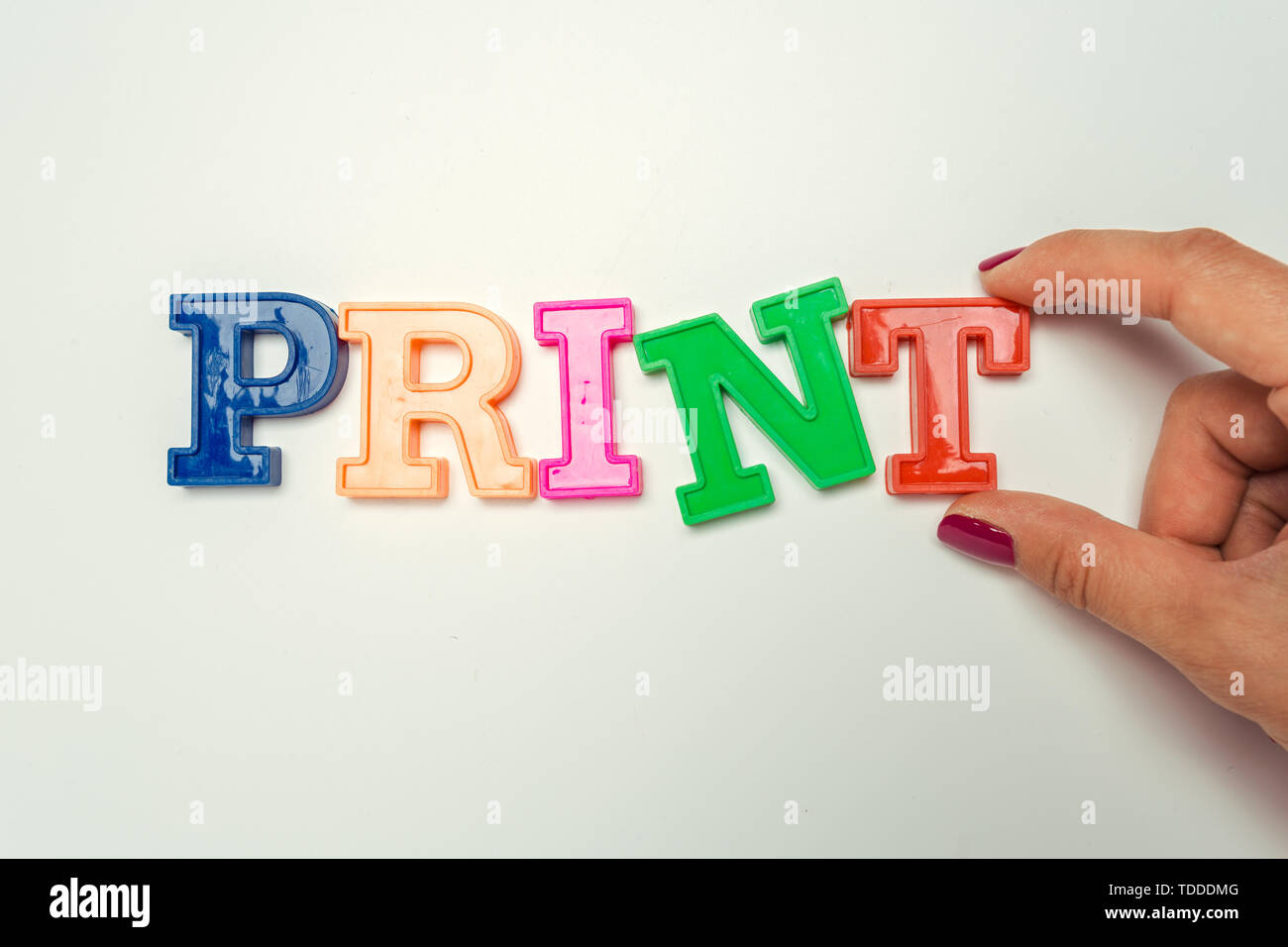 The word "PRINT" written in plastic colorful letters Stock Photo - Alamy