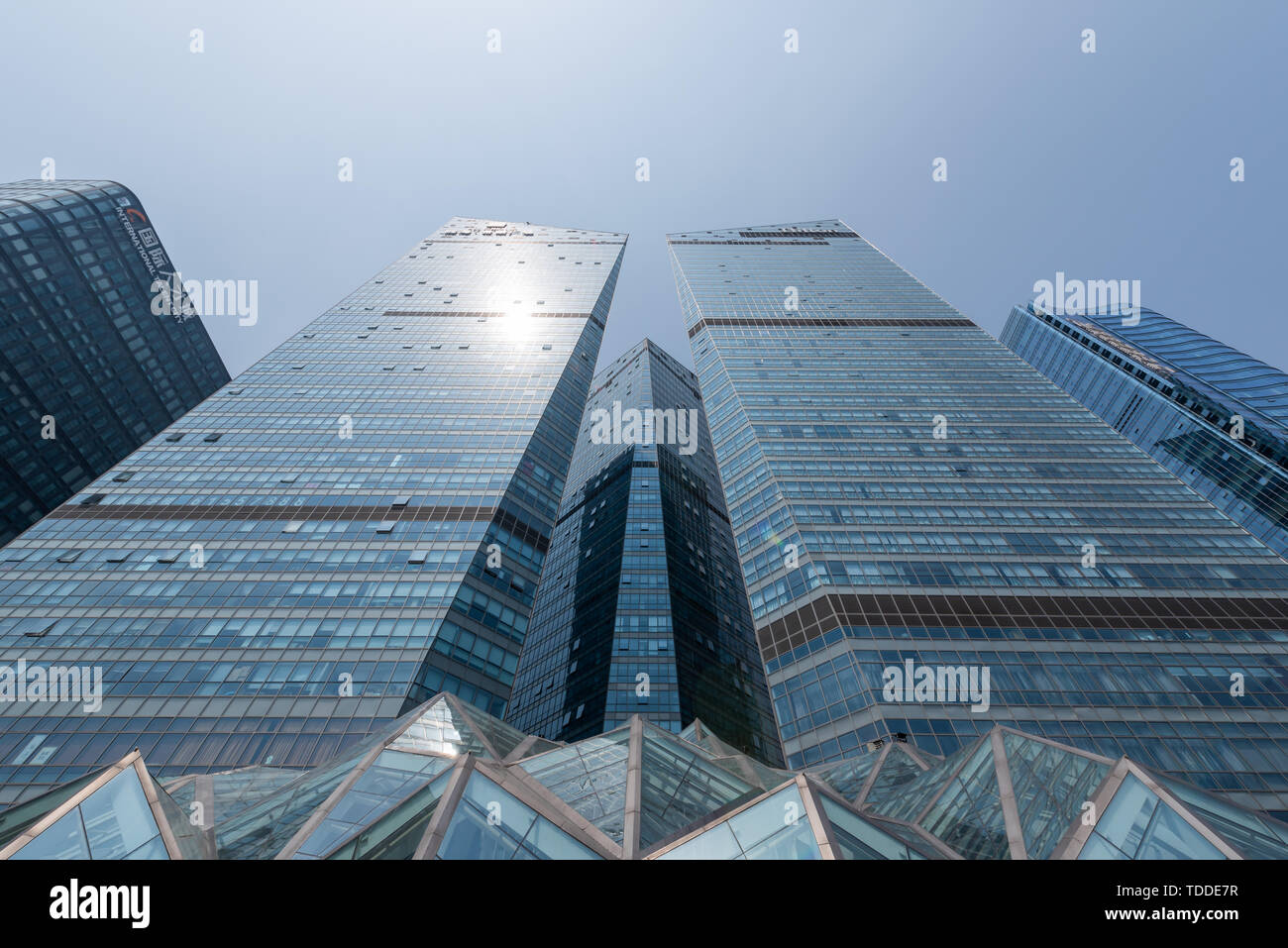 Glass façade of high-rise building building Stock Photo - Alamy