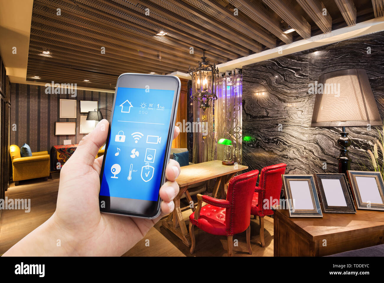 smart phone with smart home with modern cafe Stock Photo - Alamy