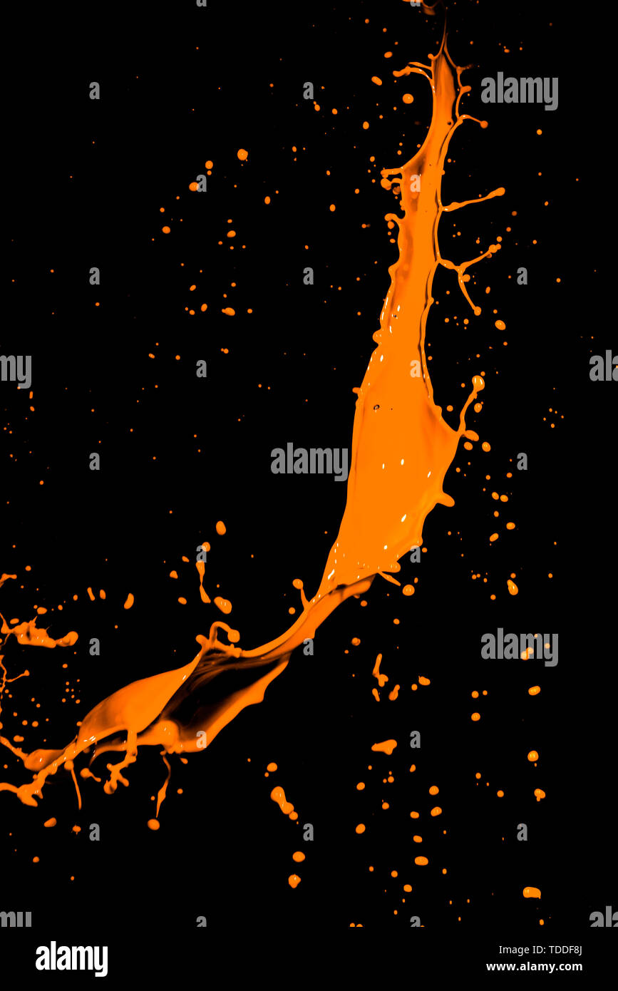 isolated orange water splash on background Stock Photo - Alamy