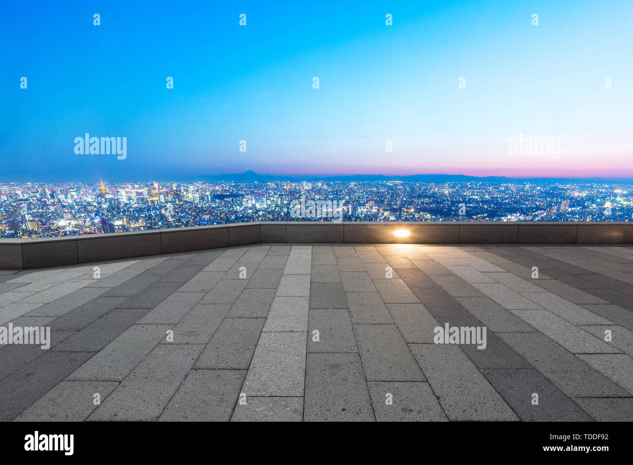 empty floor with cityscape of modern city Stock Photo - Alamy