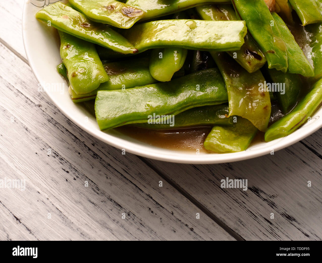 Stir-fried knife beans Stock Photo - Alamy