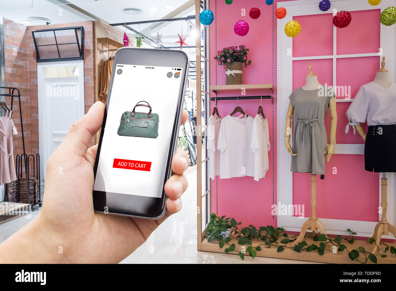 Smartphone with modern shopping mall Stock Photo - Alamy