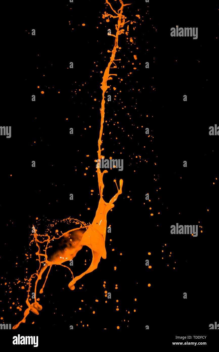 isolated orange water splash on background Stock Photo - Alamy