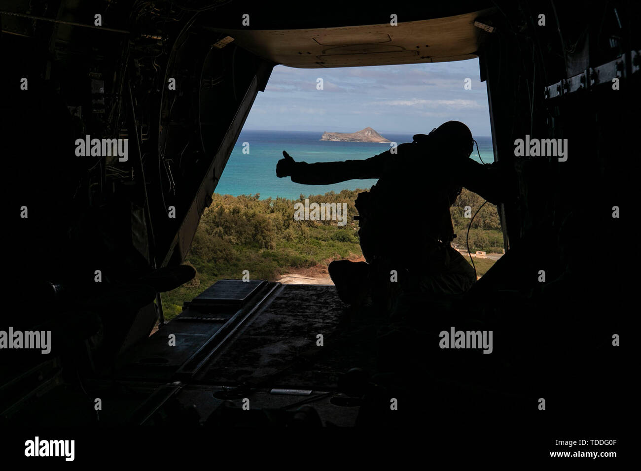 A U.S. Marine with Marine Medium Tiltrotor Squadron 268 gives a thumbs ...