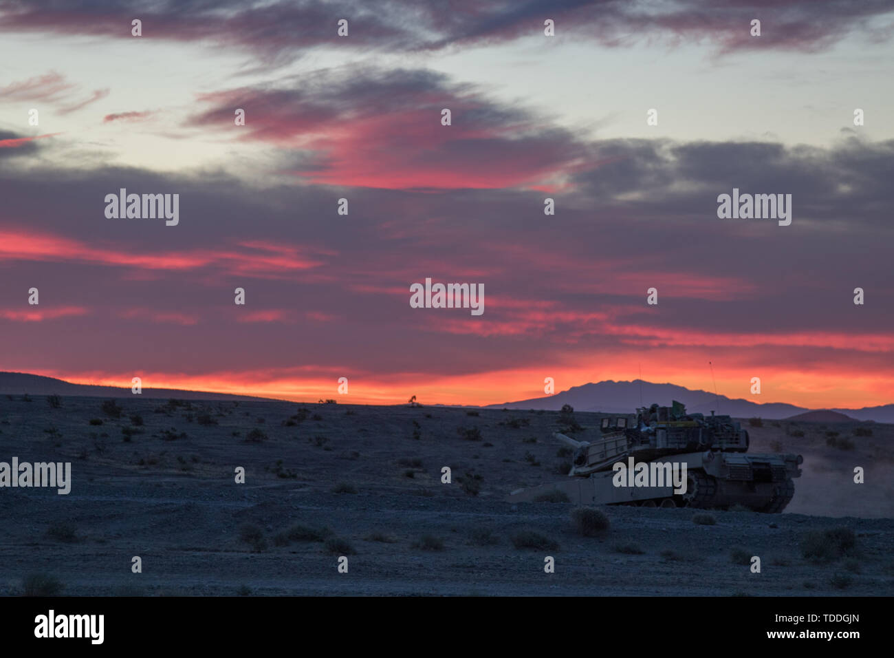 A tank from 2-116th Combined Arms Battalion move into position in the ...