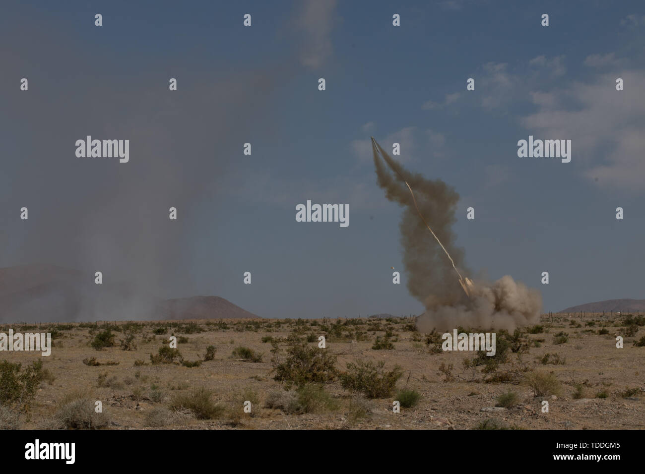 An M1150 Assault Breacher Vehicle that launches a mine clearing line ...