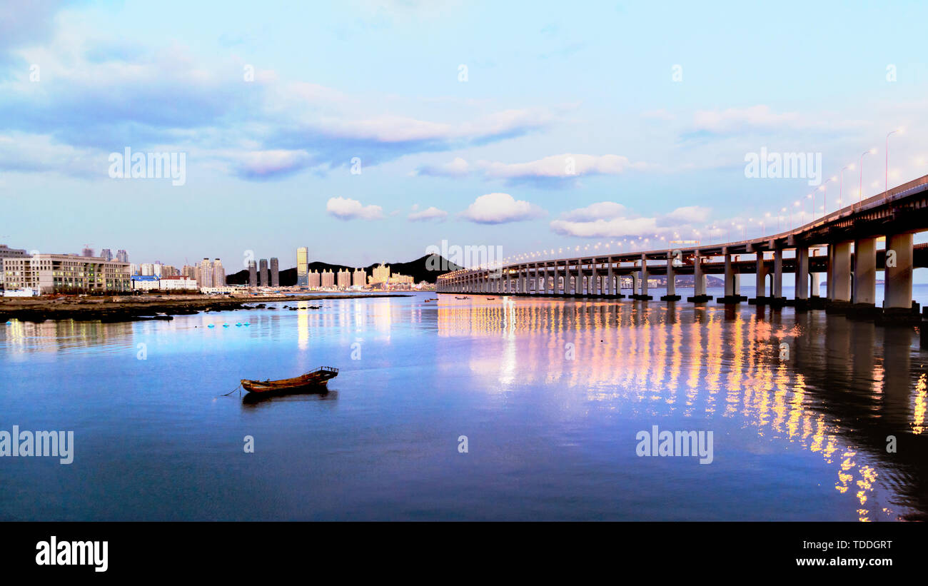 Bridge and boat Stock Photo - Alamy