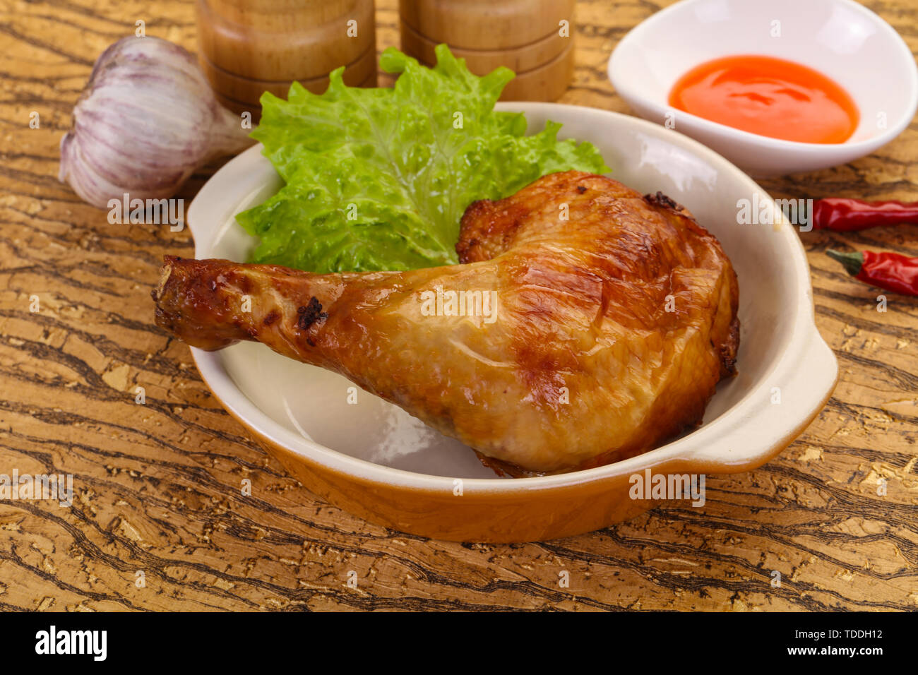 Crispy tasty Roasted chicken leg Stock Photo - Alamy