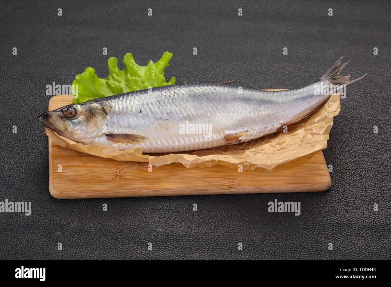 Salted herring fish ready for eat Stock Photo - Alamy