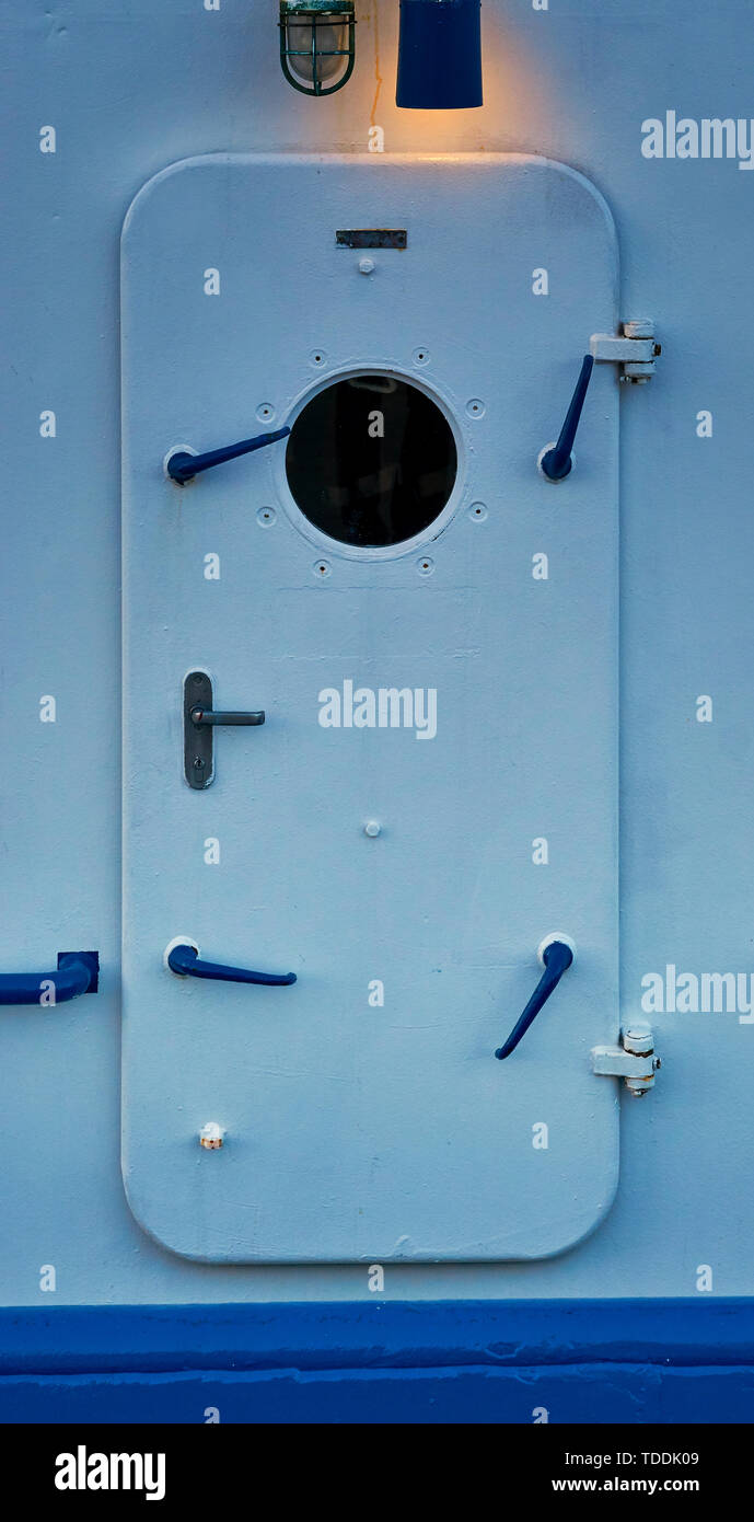 Waterproof door with lamp on a ship. Emergency door Stock Photo - Alamy