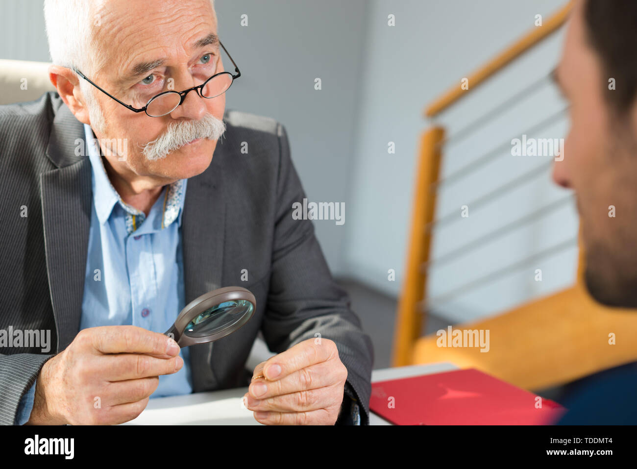 Inspecting money hi-res stock photography and images - Alamy
