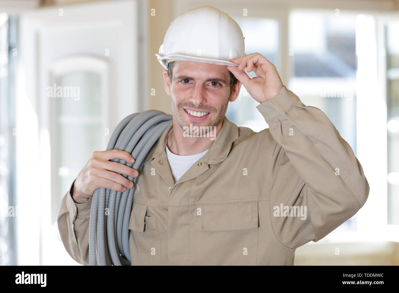 close up of electrician fitting wiring on construction site Stock Photo ...