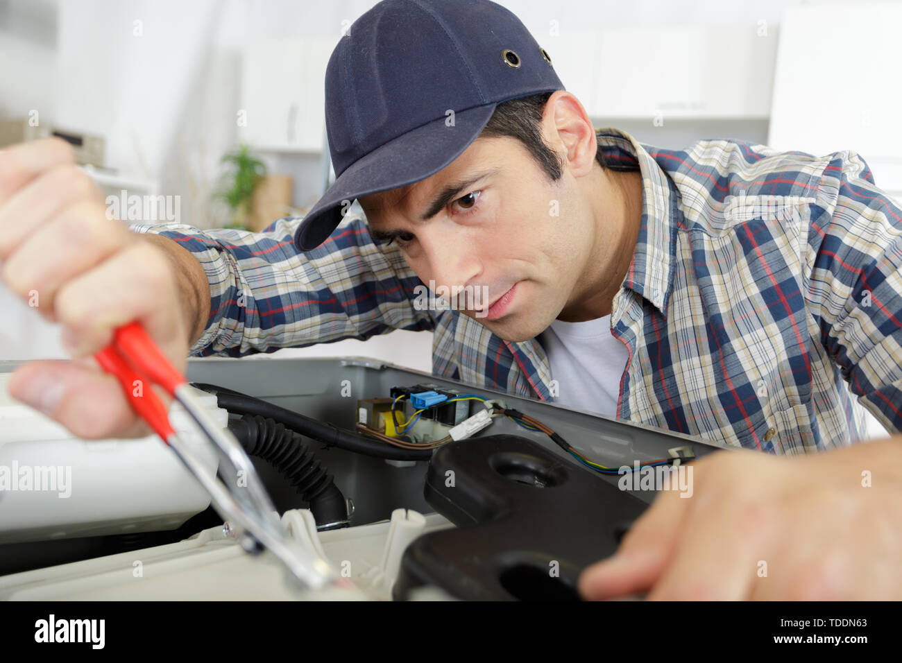 Leaking washing machine hi-res stock photography and images - Alamy