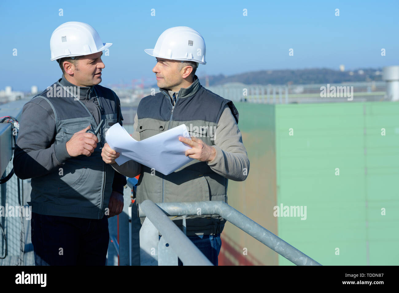 Men opening valve hi-res stock photography and images - Alamy
