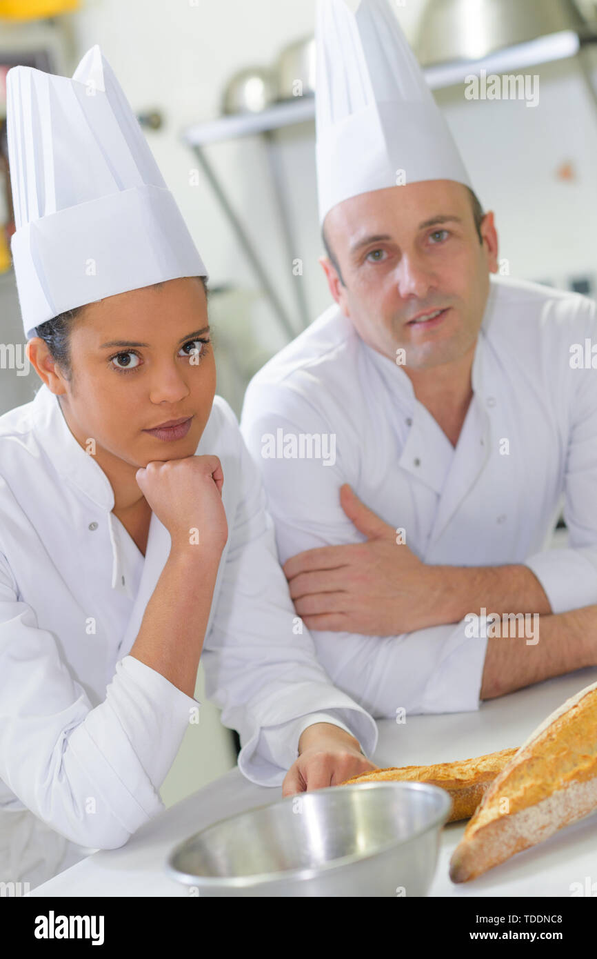 bakers posing confidently Stock Photo - Alamy