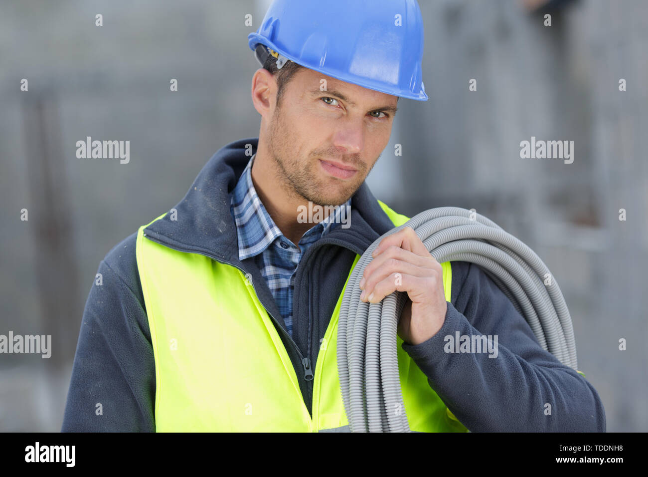 electrician technician holding cables Stock Photo - Alamy