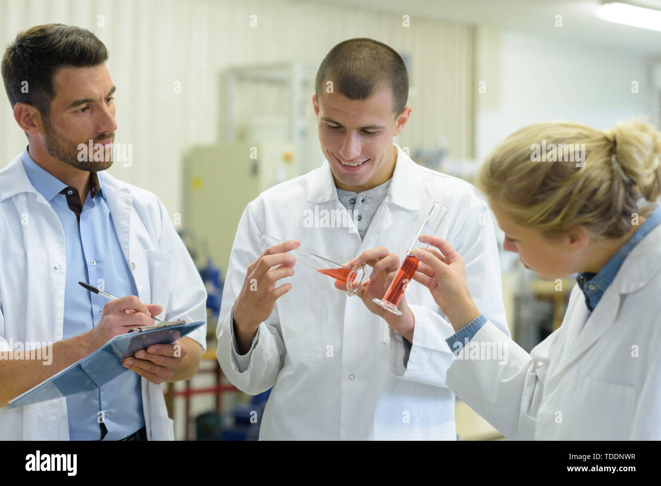 Scientists talk hi-res stock photography and images - Alamy