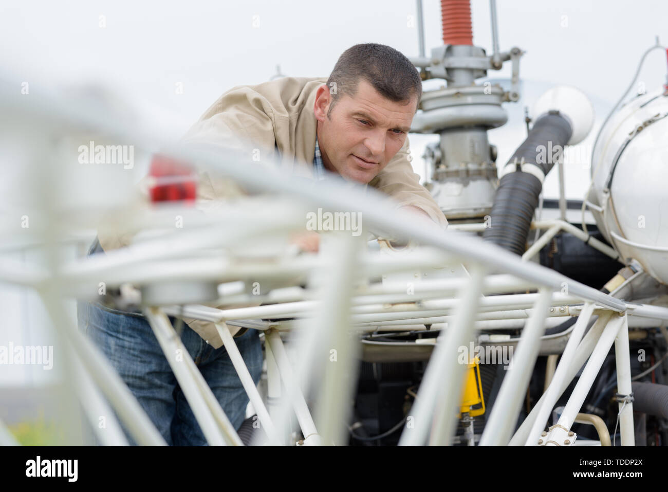 helicopter technician at work Stock Photo - Alamy