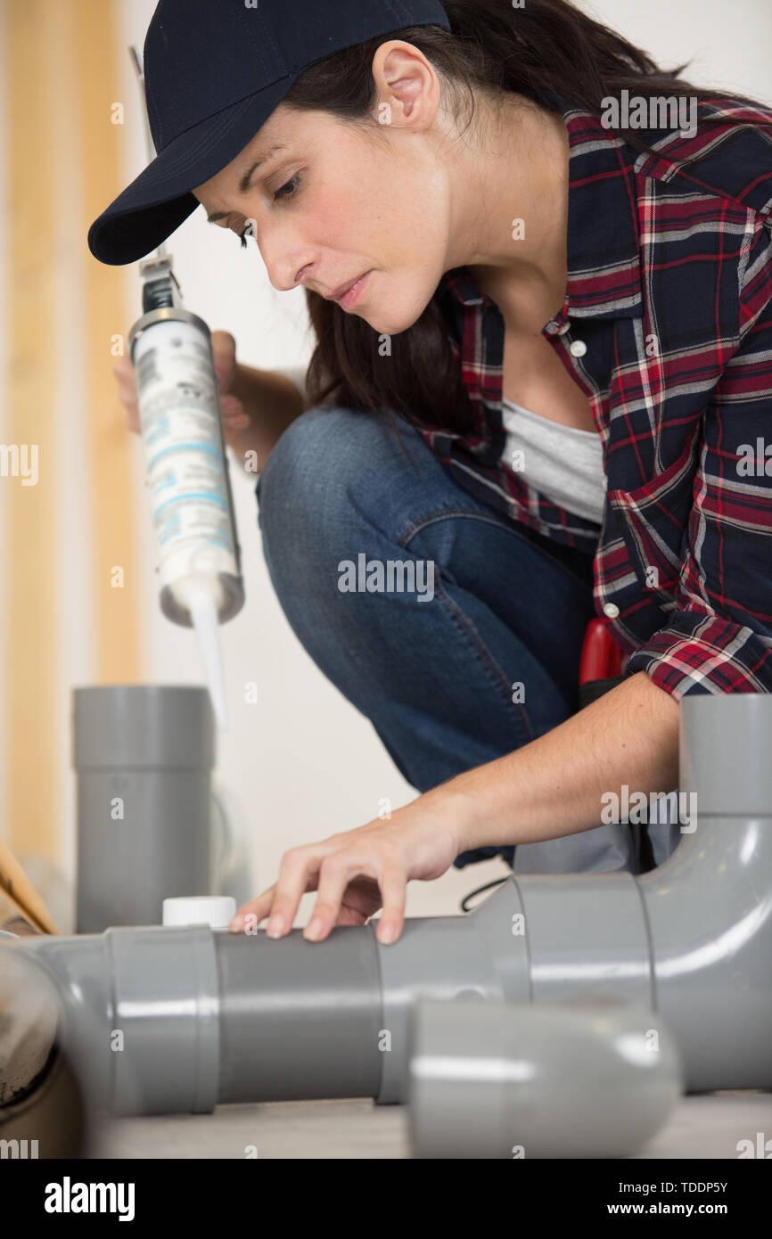 Female Construction Worker Pipes High Resolution Stock Photography and ...