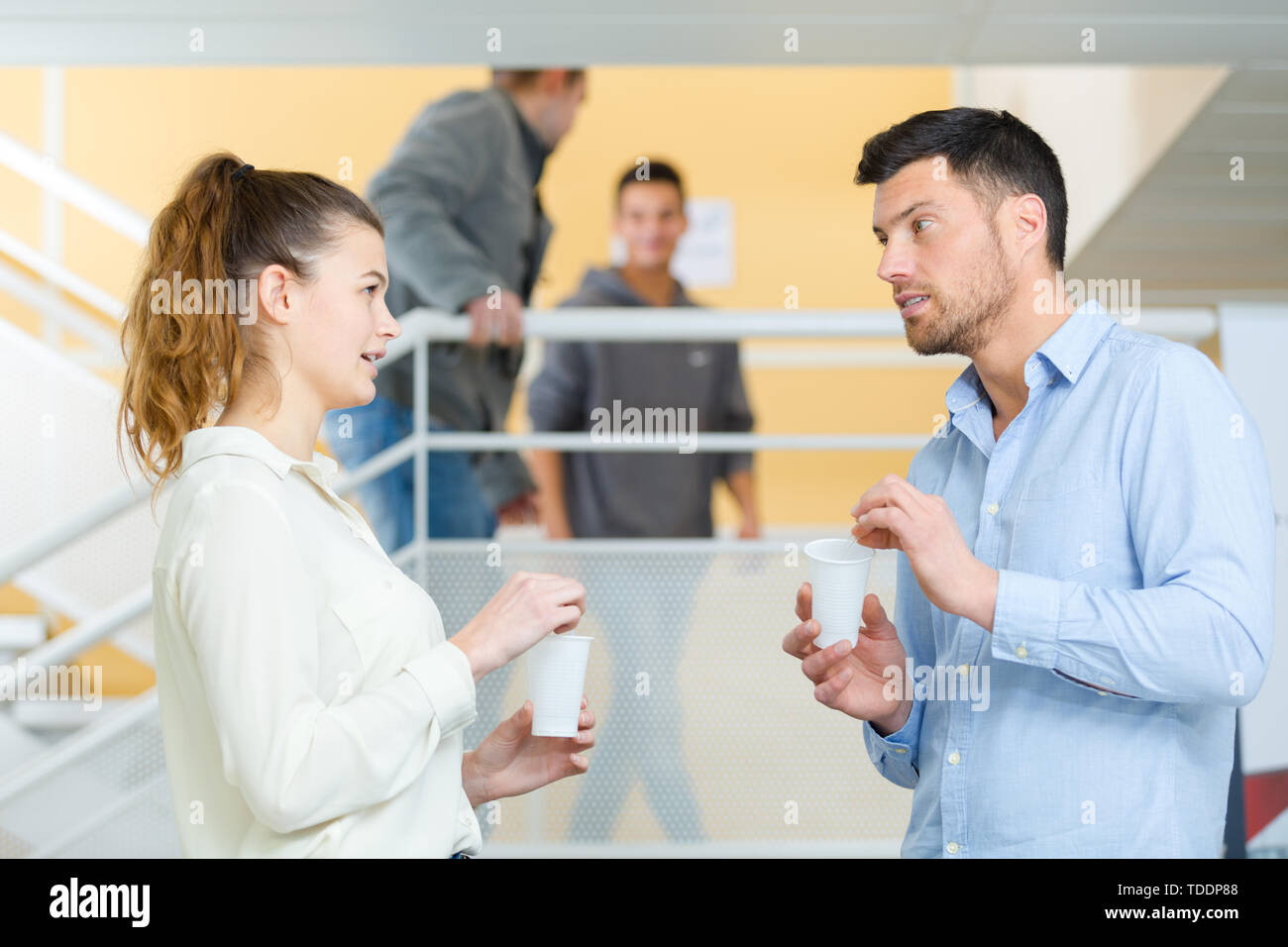 Teacher student talking hallway hi-res stock photography and images - Alamy