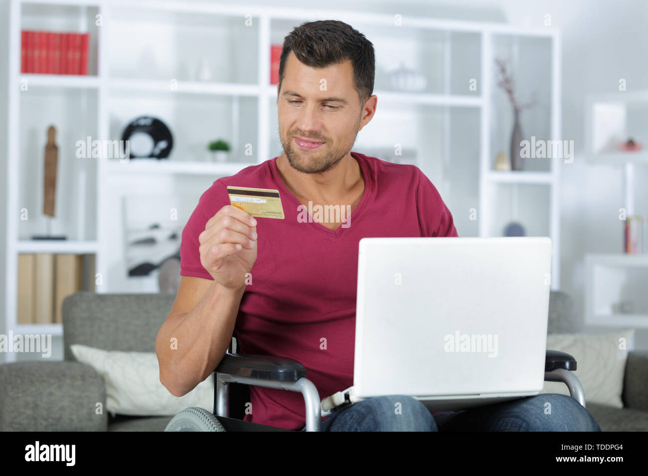 Disabled man operating wheelchair hi-res stock photography and images ...