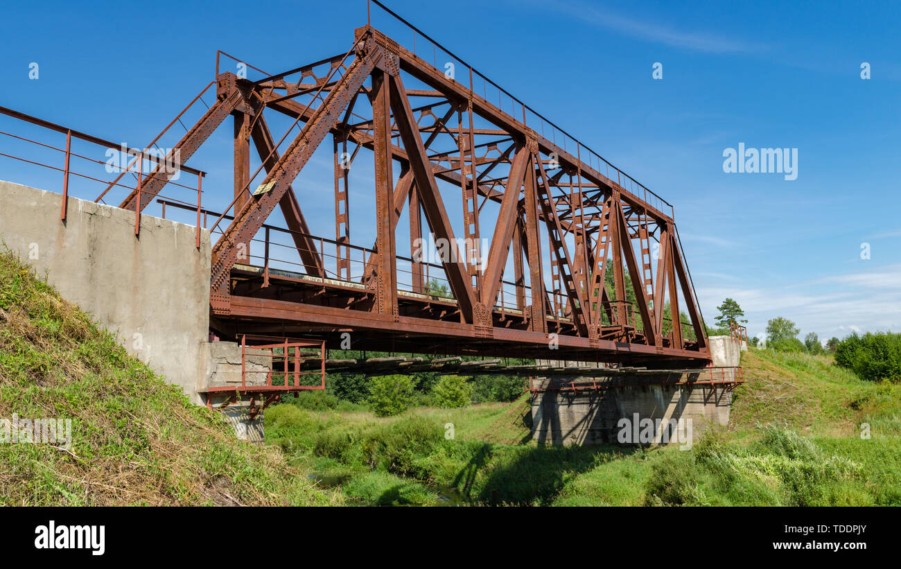 Railway bridge across the river for transportation of goods and ...