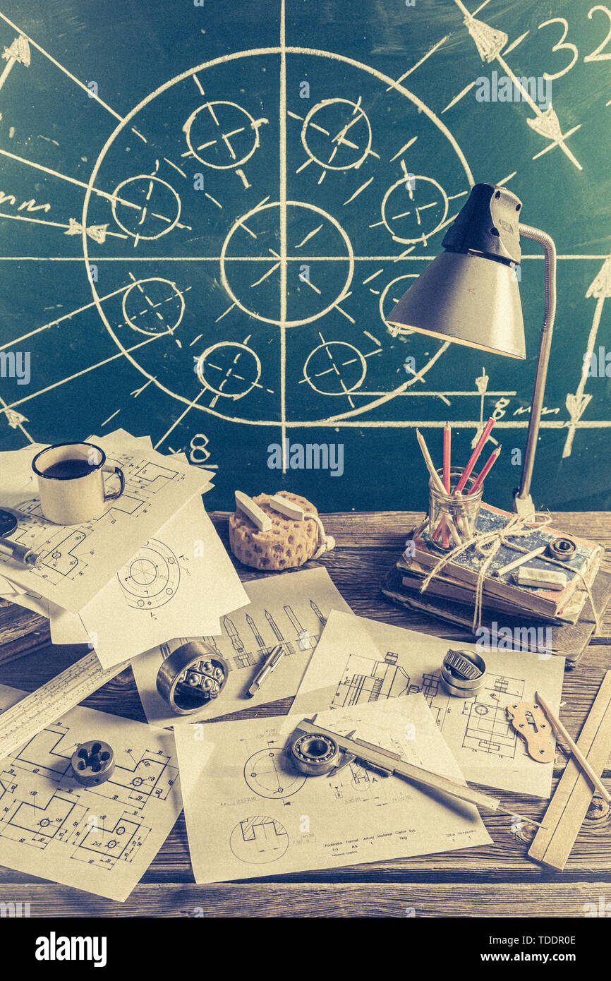 Laboratory technical drawing at school on green blackboard background ...