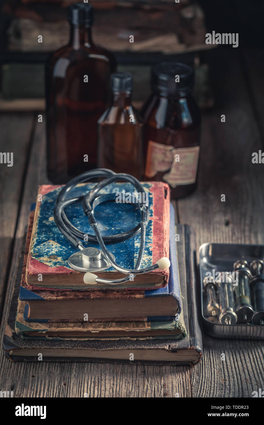 Antique stethoscope and books as medical education concept Stock Photo ...