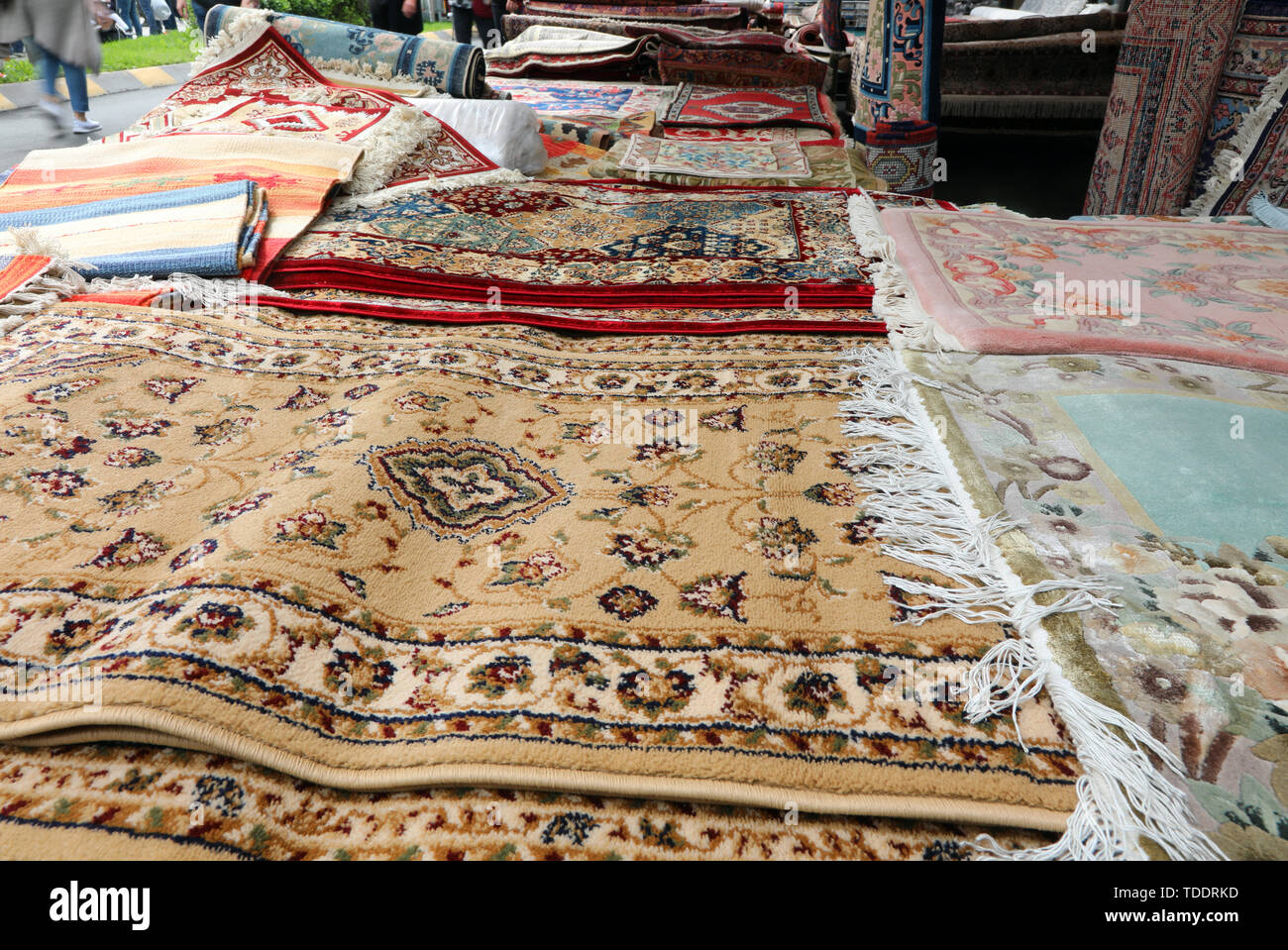 Persian carpet stall for sale in the outdoor market along the streets ...