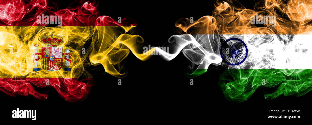 Spain vs India, Indian smoky mystic flags placed side by side. Thick ...