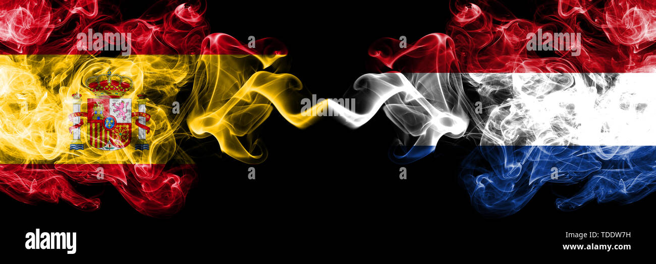 Spain vs Netherlands, Dutch smoky mystic flags placed side by side ...