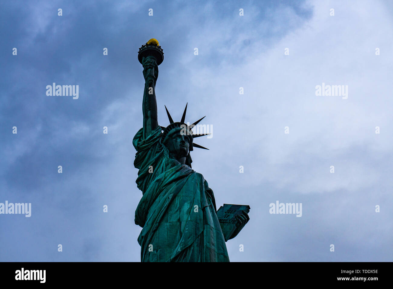Statue of Liberty on light blue sky, landmark in New York City, USA ...