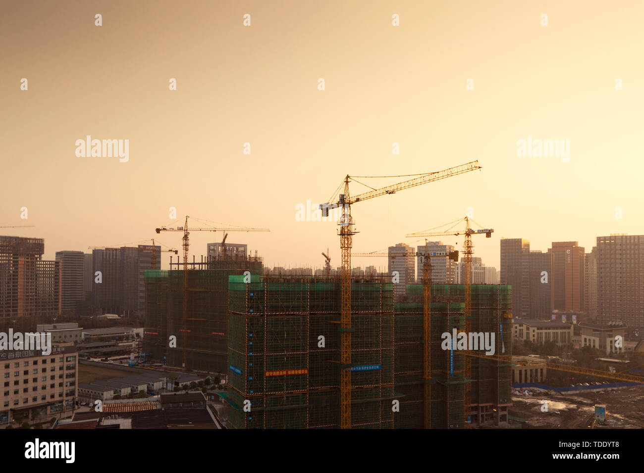 new construction site in modern city with sunbeam Stock Photo - Alamy