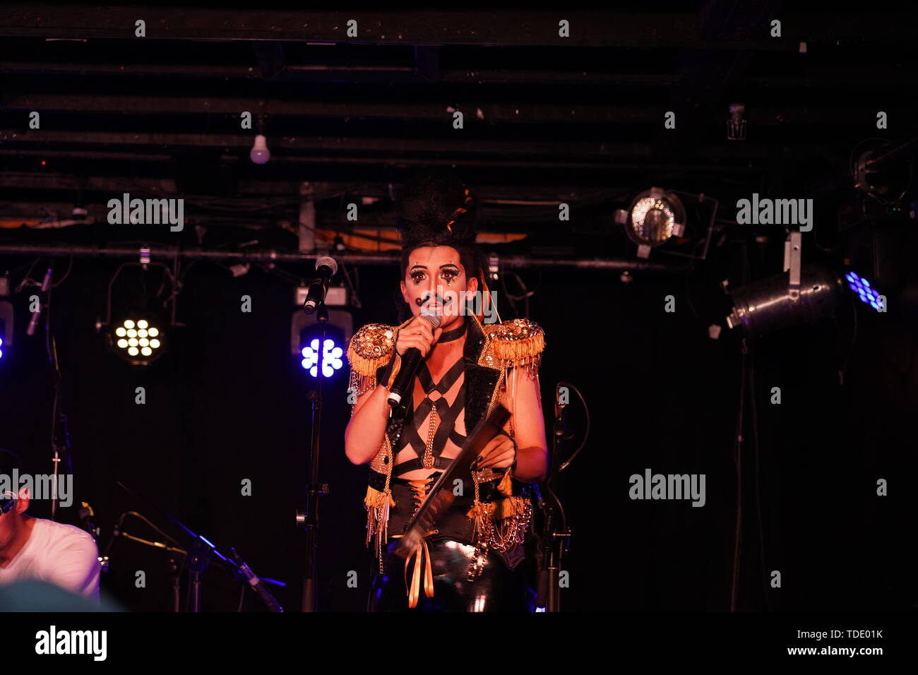 Girl announcing the show Stock Photo - Alamy