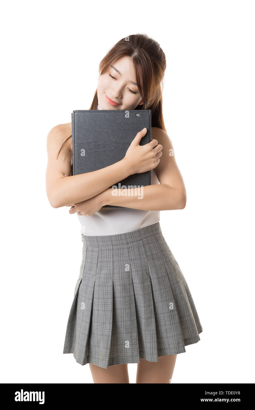 Beautiful cute college student against white background Stock Photo - Alamy