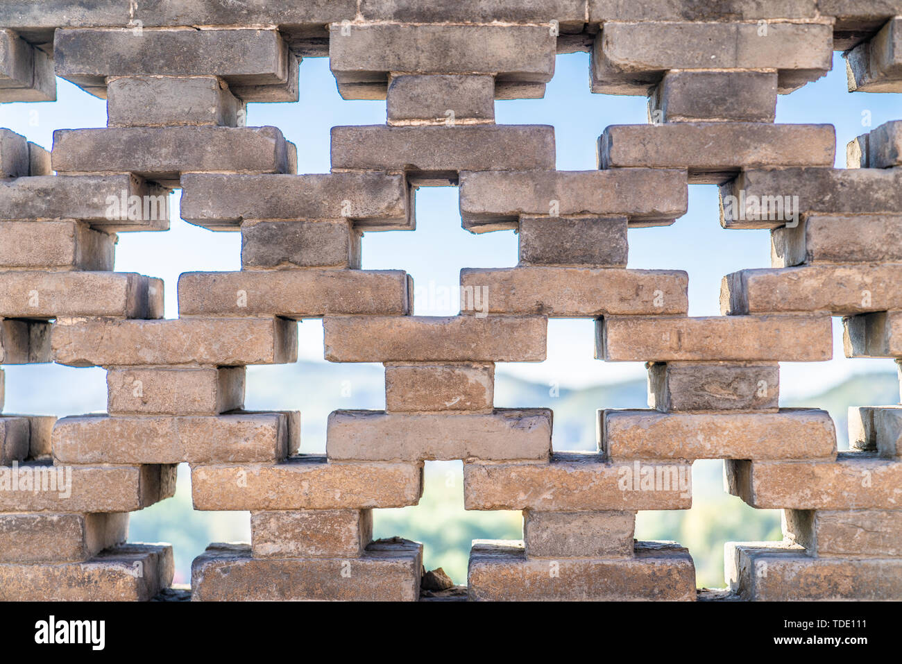 A brick wall with a cross gap Stock Photo - Alamy