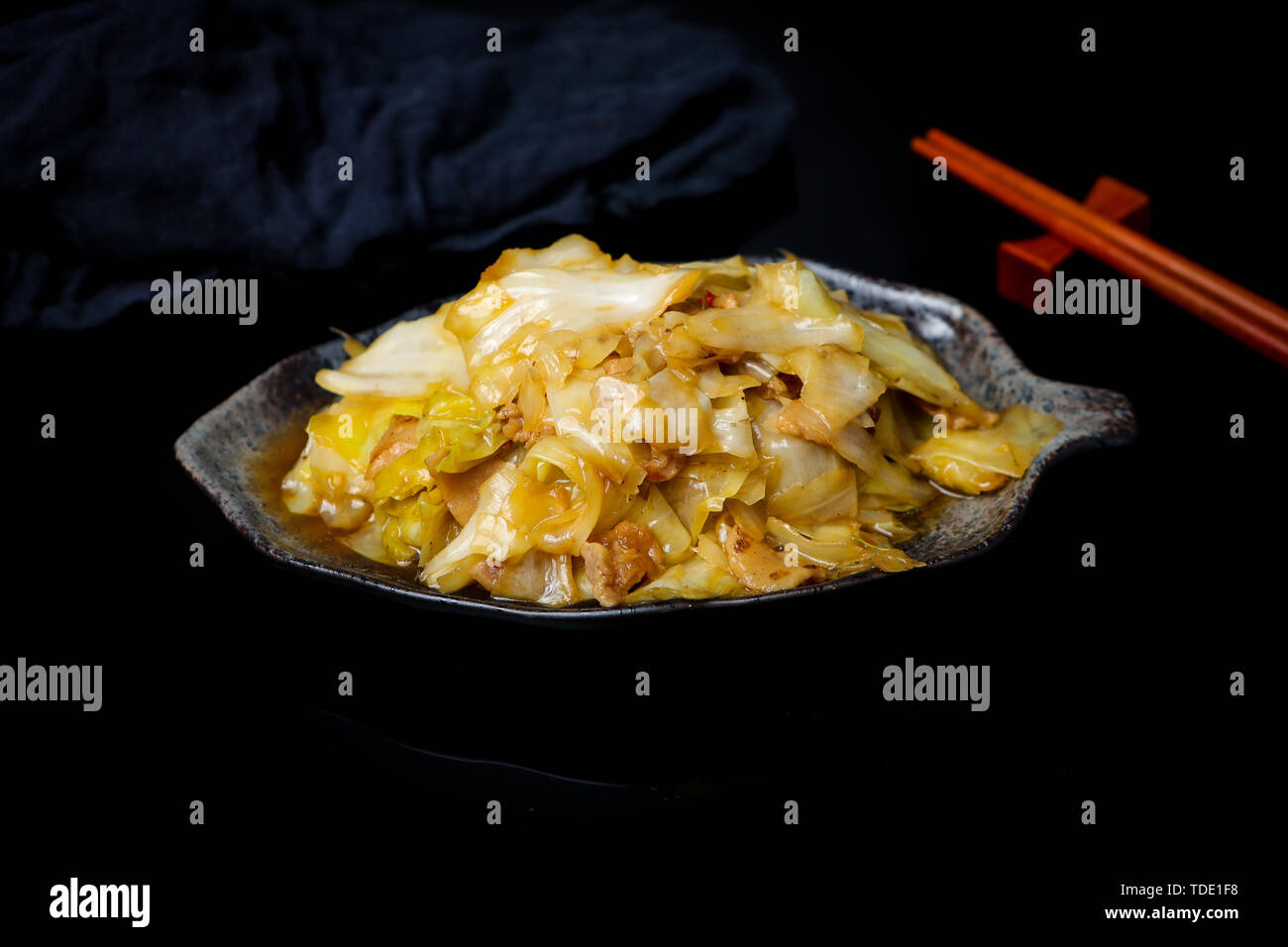 Hand torn cabbage hi-res stock photography and images - Alamy