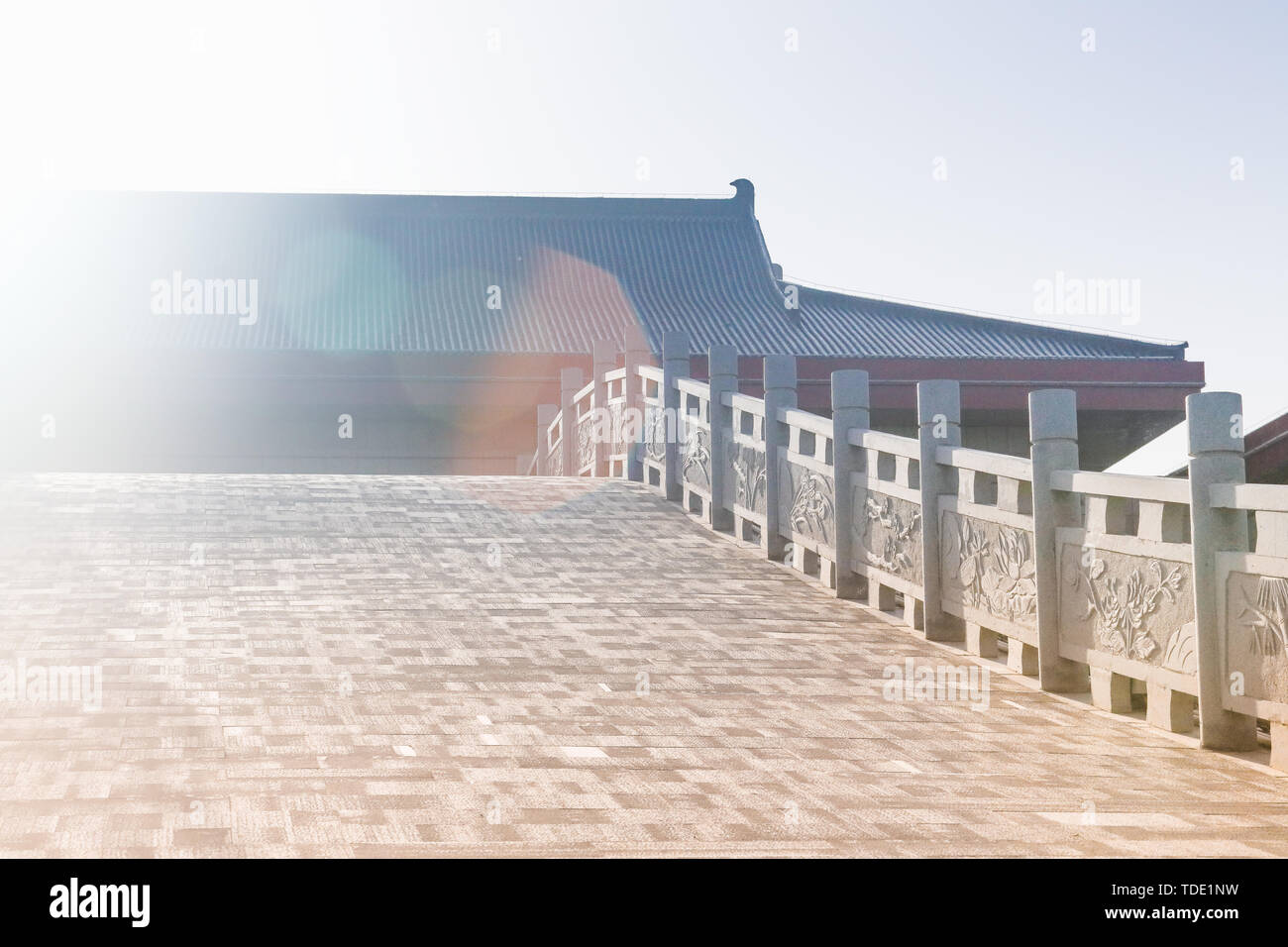 Stone bridge railings in backlight with palace Stock Photo - Alamy